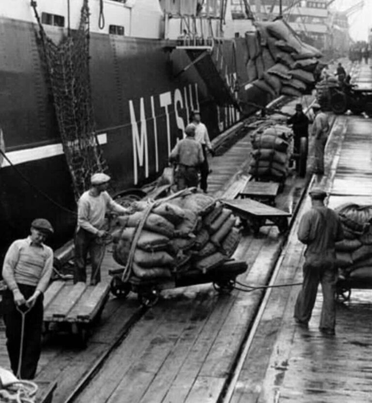 Longshoremen working the docks moving cargo by hand before the days of containerization – ILA Union
